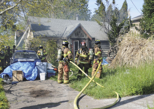 House fire north of OSU nearly spreads to neighboring residence