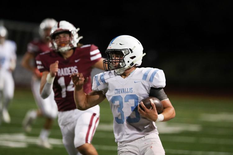 Prep football: Worsch carries Spartans past Raiders