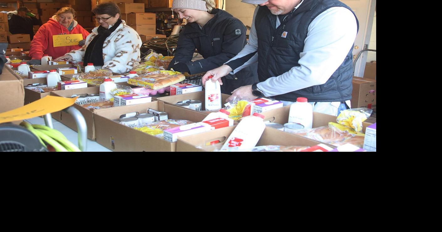 Boxing items for Thanksgiving meal at SCCAP | Local News ...