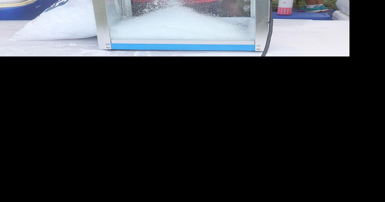 Making shaved ice on a hot day at the re-enactment | News ...