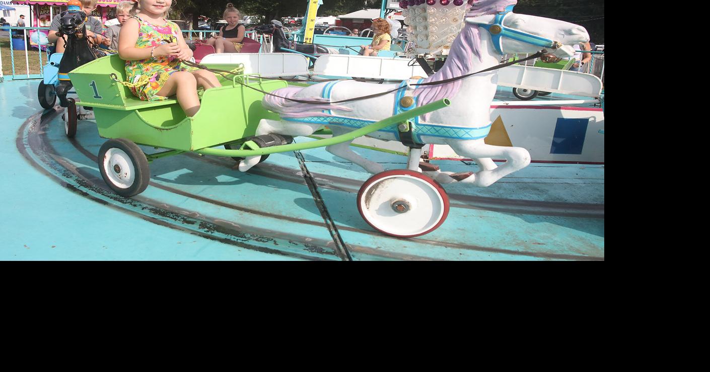 Taking a turn on a ride at the fair | Local News | gettysburgtimes.com