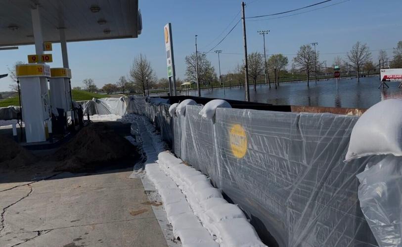 Davenport business owner's friends deploy dumpsters in flood fight
