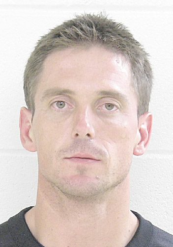 Rural Mason City man faces burglary, firearms charges