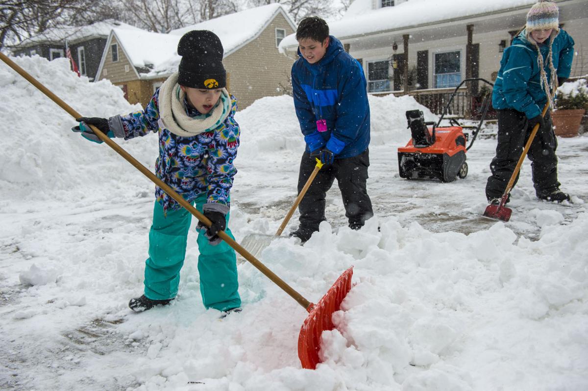 Kids help neighbors dig out of record-breaking Mason City snow