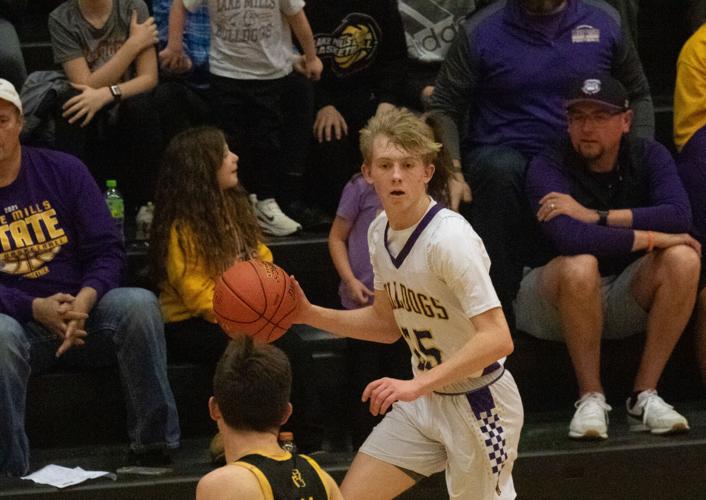 High School Boys Basketball: Lake Mills holds off Garrigan, advances to ...