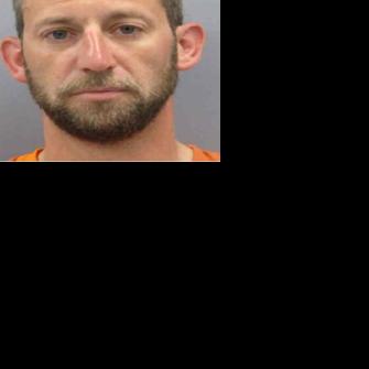 Garner man accused of shooting vehicle