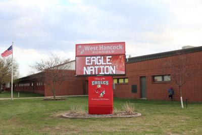 West Hancock school board approves price quotes, resignation