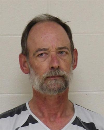 Mason City man accused of shooting at woman, having explosives