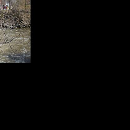 Kayaks caught in dam undertow