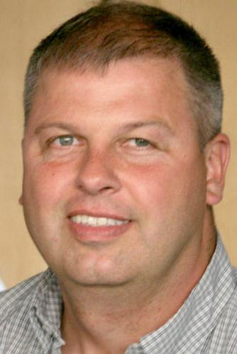 Man arrested in murder of ex-MC resident