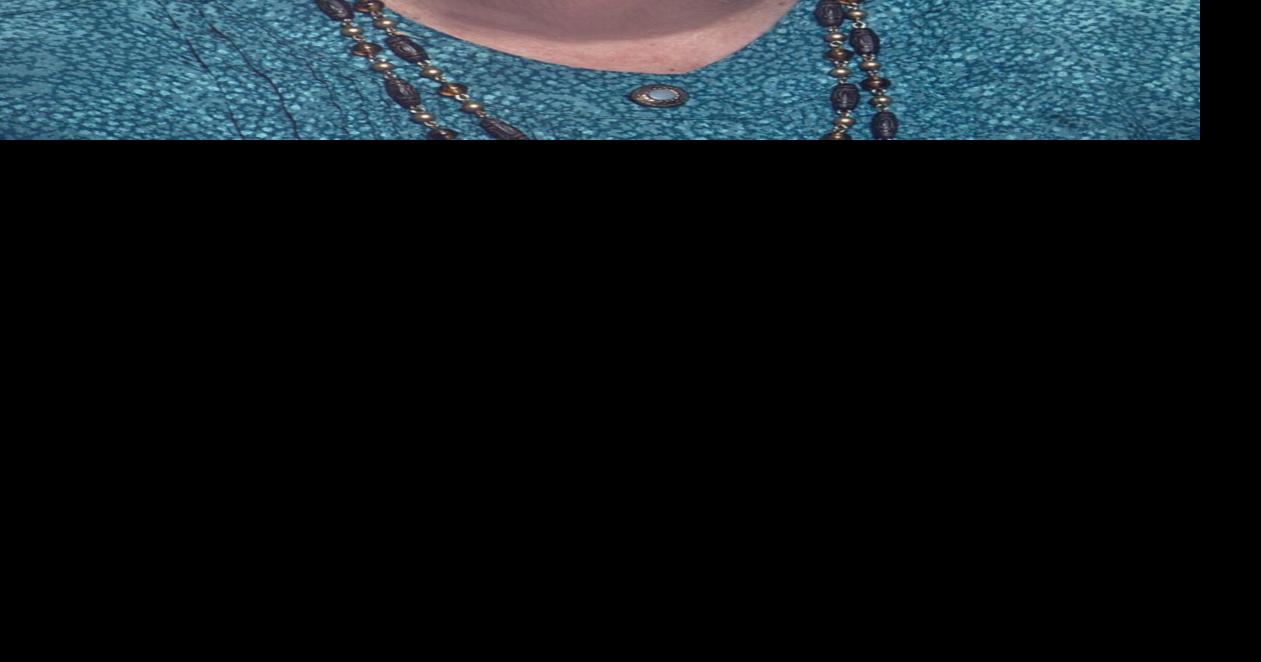 Lucile M. Scharper, Osage