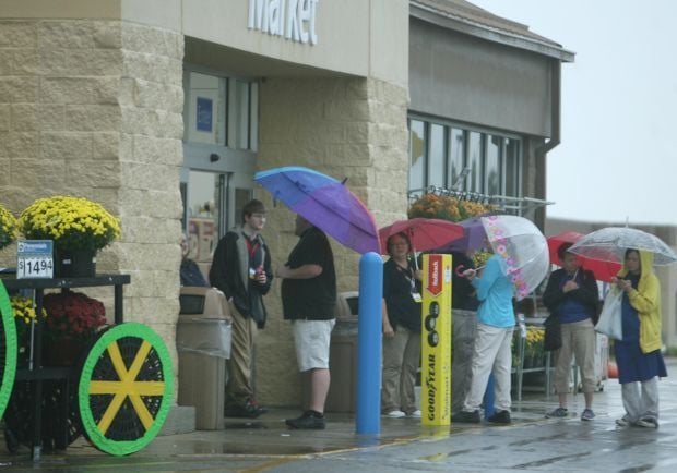 Walmart roof collapses; one man rescued from nearby trailer