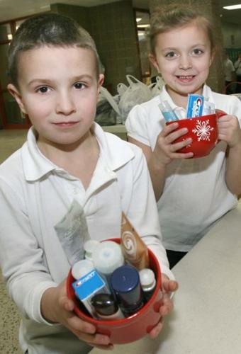 Newman students pack coffee mugs full of love