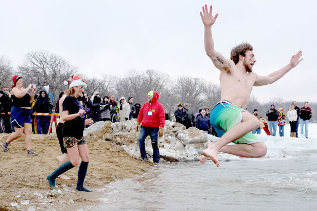 Shivering for charity: Polar Bear Club dip trades goosebumps for good works