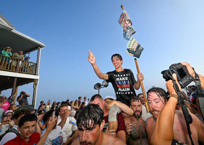A new champion is crowned: White claims his first Greasy Pole title ...