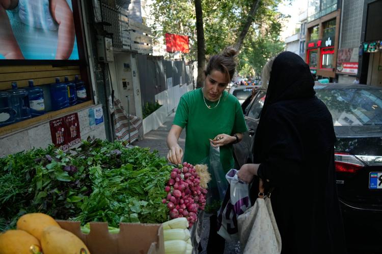 Iranians endure war fatigue and soaring prices as conflict deepens ...