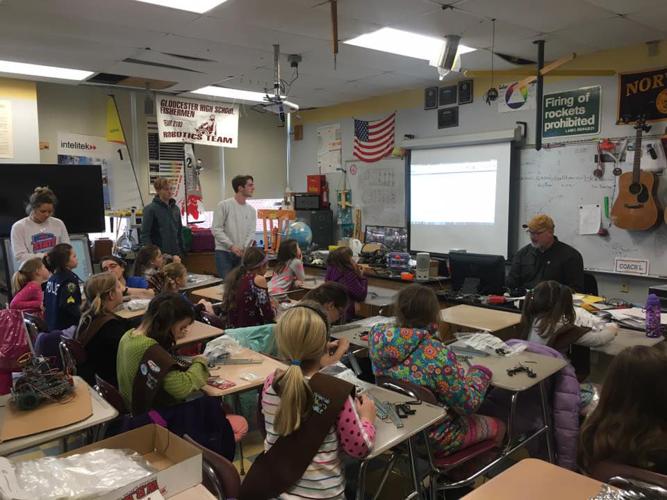 Teens help Girls Scouts create, build robots | Local News ...