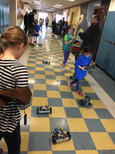 Teens help Girls Scouts create, build robots | Local News ...