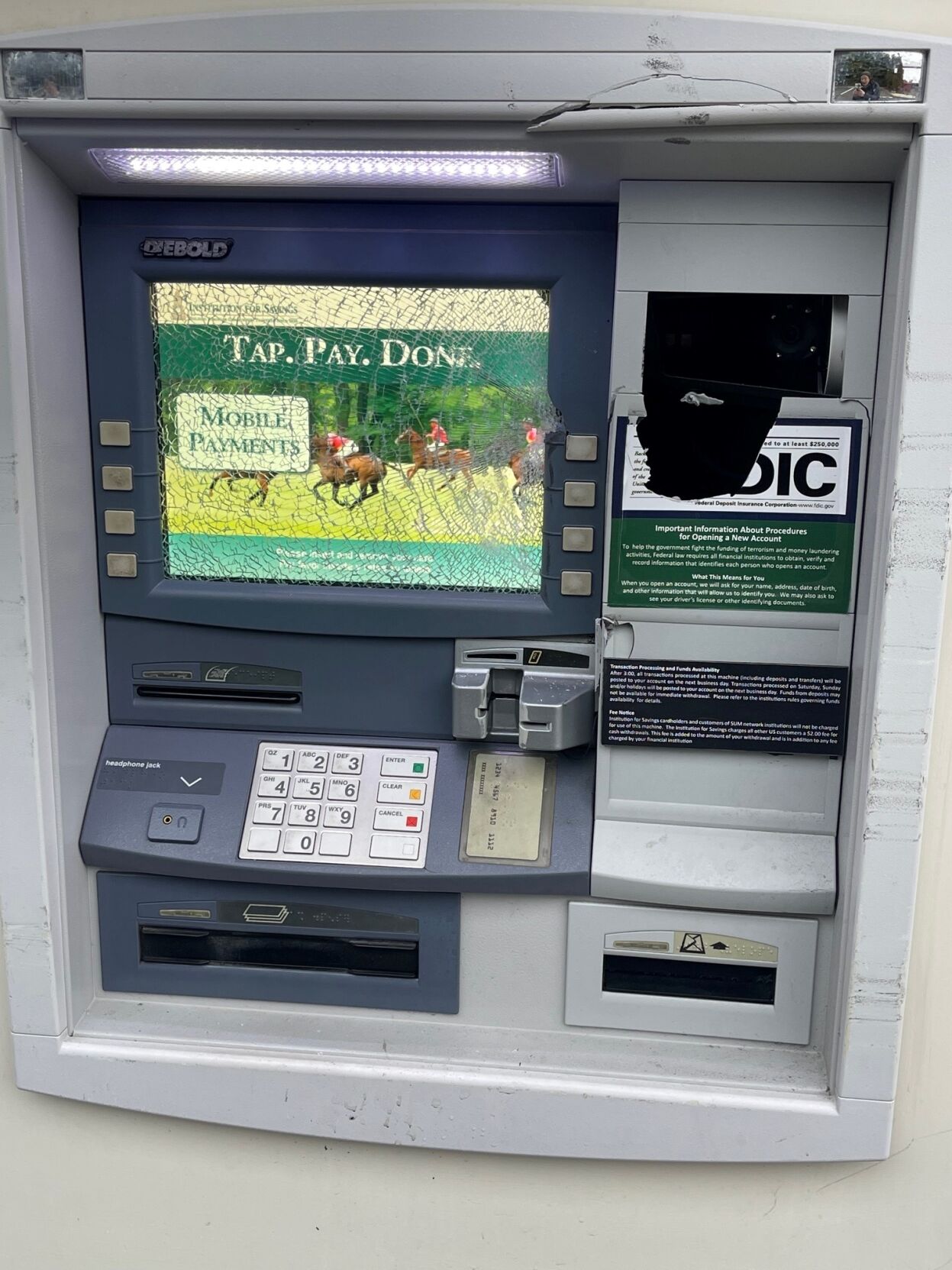 Vandals severely damage bank's drive-up ATM | Business ...