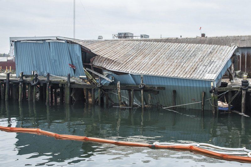 Waterfront cleanup begins after wharf collapse | Fishing Industry News ...