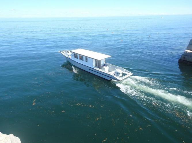 'Boat in a crate' takes to the water | Local News | gloucestertimes.com