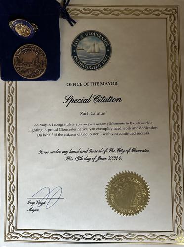 A true honor: Gloucester's Calmus receives special citation by city ...