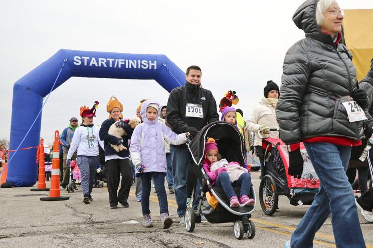 Record-breaking crowd races to the finish line during Turkey Stampede ...