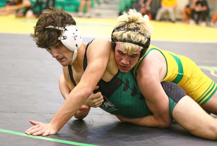 PREP BOYS WRESTLING: Northridge sweeps NLC trio, others deal with ...
