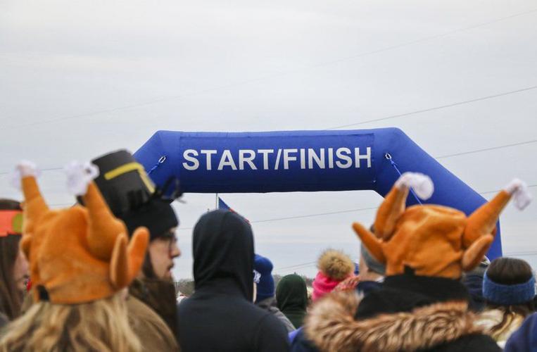 Record-breaking crowd races to the finish line during Turkey Stampede ...