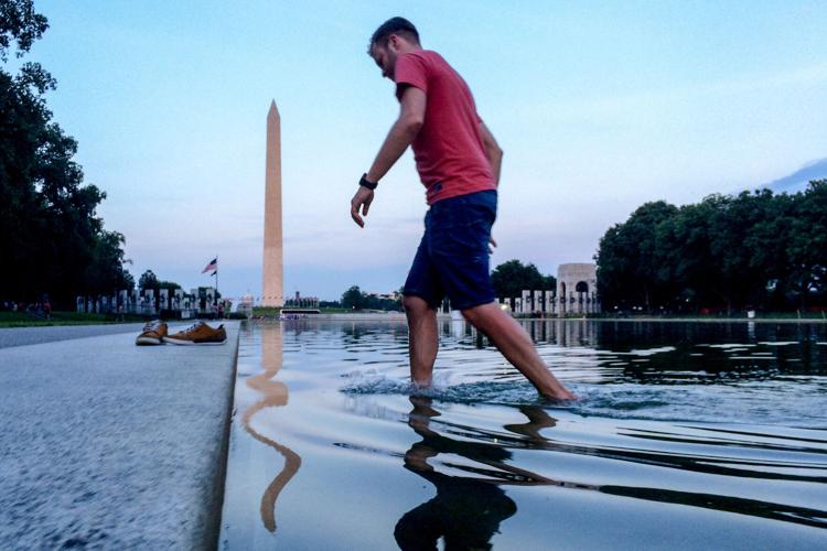 A Reflecting Pool that has long enticed visitors now gains police ...