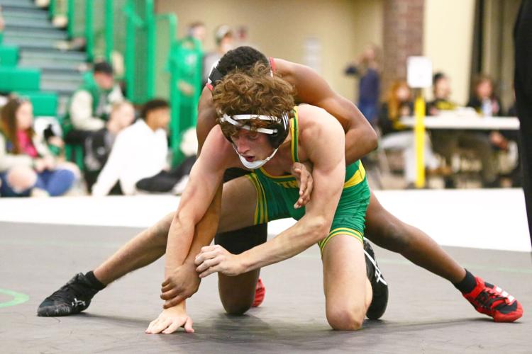 PREP BOYS WRESTLING: Northridge sweeps NLC trio, others deal with ...