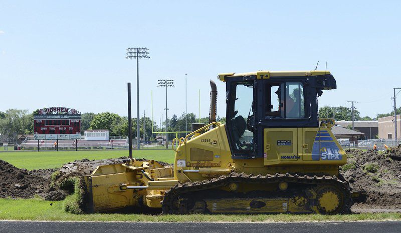 FIELD FACELIFT: Crews begin installing artificial turf on Foreman Field ...