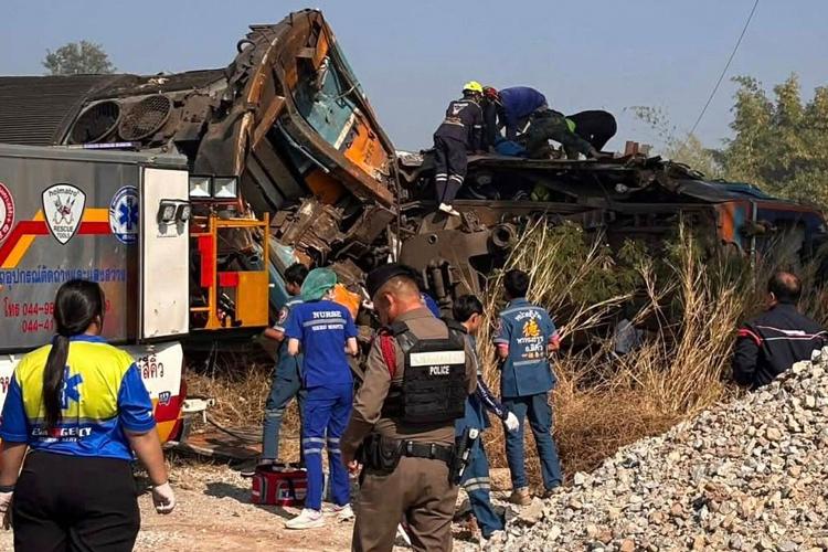 A construction crane falls onto a moving train in Thailand, killing at ...