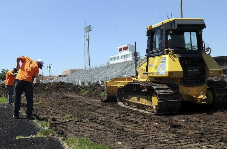 FIELD FACELIFT: Crews begin installing artificial turf on Foreman Field ...