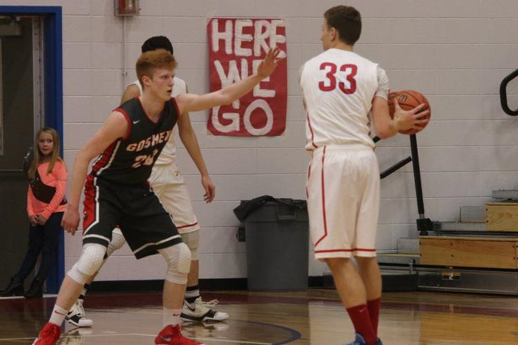 BOYS BASKETBALL: Rocking Robinson leads Goshen past West Noble | Local ...