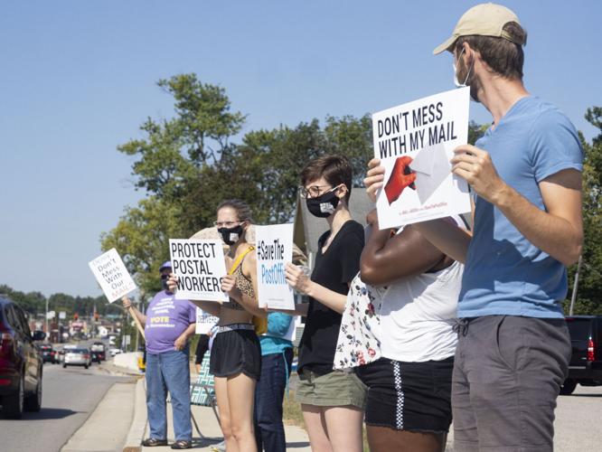 Group rallies at Goshen post office in support of postal workers | News ...