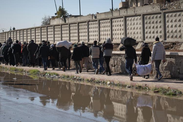 Kurdish fighters evacuated from Aleppo after days of violent clashes ...