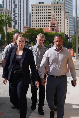 Teen charged with killing stepsister on Carnival Cruise remains free ...
