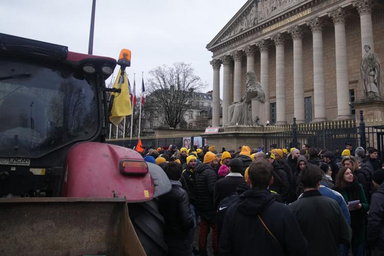 Farmers drive tractors through Paris and block highways in Greece to ...