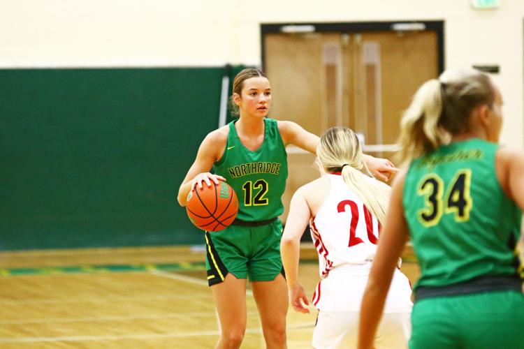 GALLERY: Northridge and NorthWood girls basketball at Day 1 of the ...