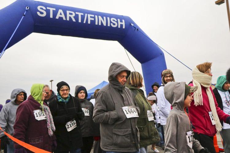 Record-breaking crowd races to the finish line during Turkey Stampede ...