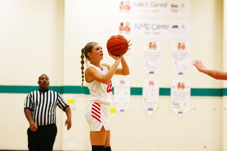 GALLERY: Northridge and NorthWood girls basketball at Day 1 of the ...