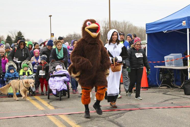 Record-breaking crowd races to the finish line during Turkey Stampede ...