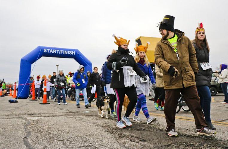 Record-breaking crowd races to the finish line during Turkey Stampede ...