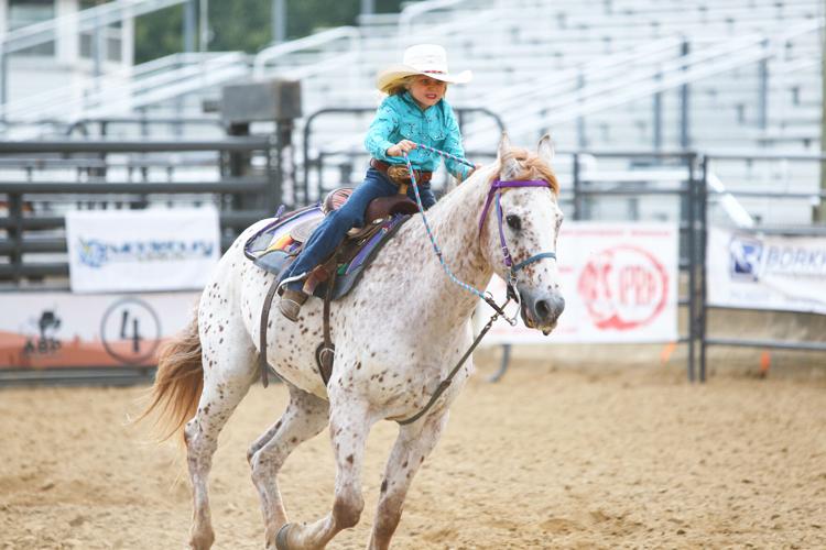 Steer wrestlers, calf ropers and barrel racers captivate the crowd ...