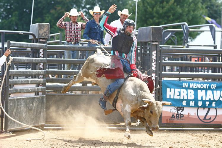 Steer wrestlers, calf ropers and barrel racers captivate the crowd ...