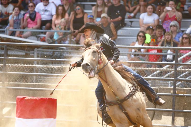 Steer wrestlers, calf ropers and barrel racers captivate the crowd ...