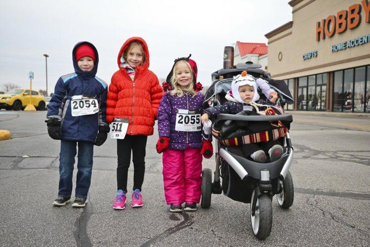 Record-breaking crowd races to the finish line during Turkey Stampede ...