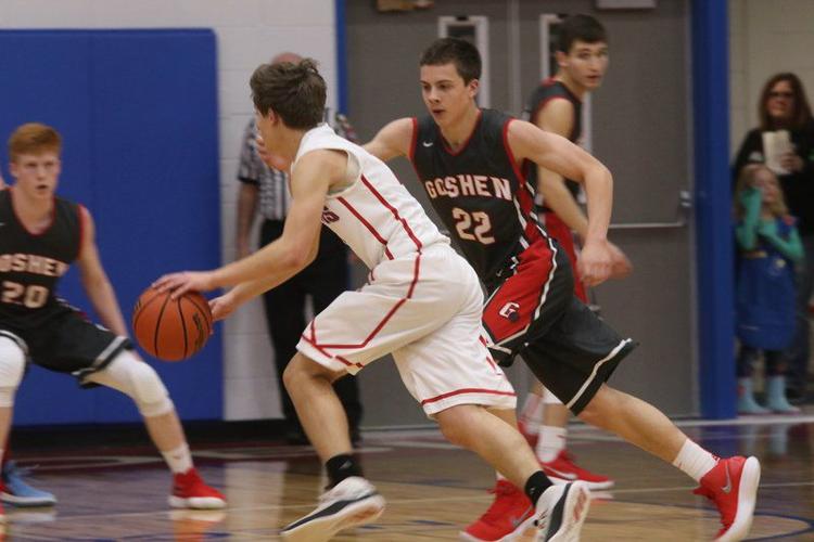 BOYS BASKETBALL: Rocking Robinson leads Goshen past West Noble | Local ...