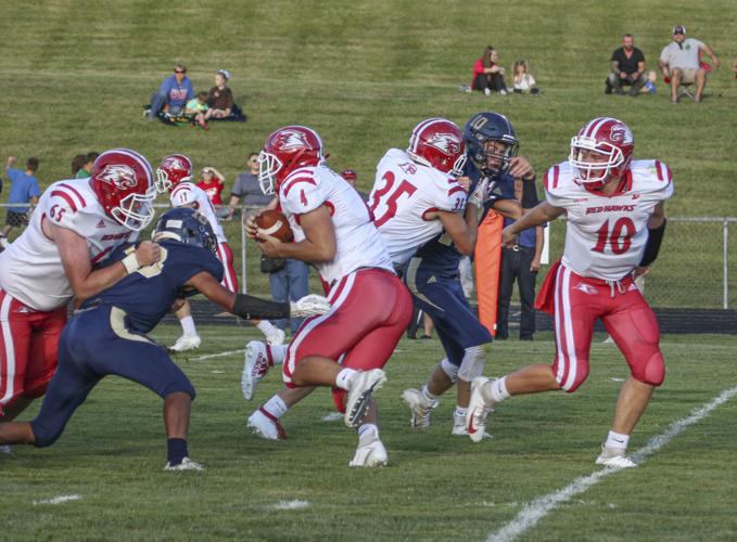 PREP FOOTBALL; RedHawks hold off feisty Falcons in season opening win ...